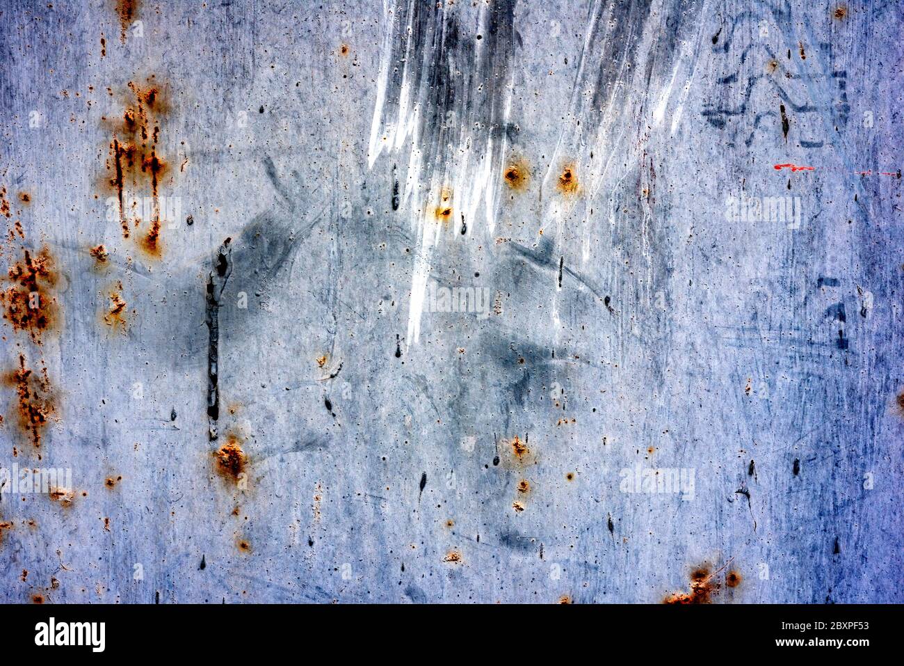 Texture of a metal wall with cracks and scratches which can be used as ...