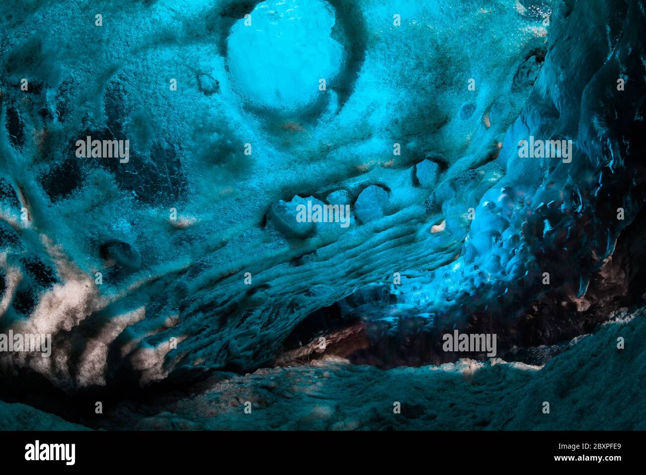 Blue ice cave view during winter in Jokulsarlon, Iceland Stock Photo ...