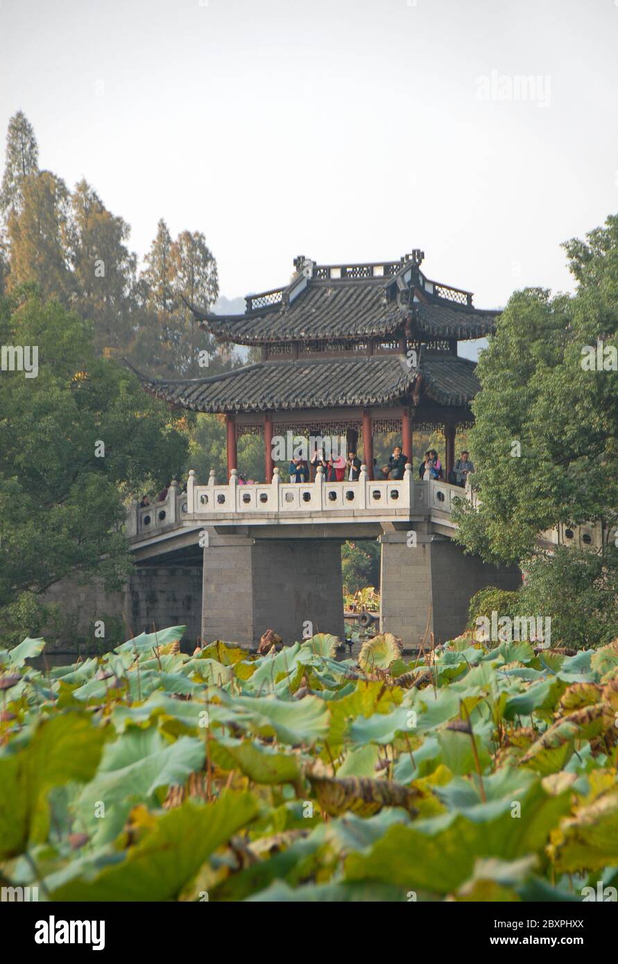 West Lake (Xi Hu) in Hangzhou, Zhejiang Province, China. Yudai bridge ...