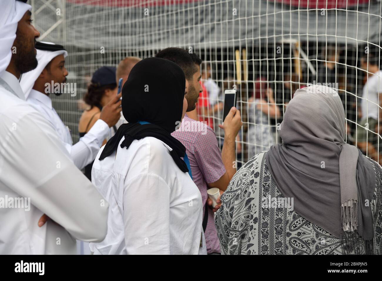 Moscow, Russia - July 14, 2018: Qatari Football fans men and women in ...