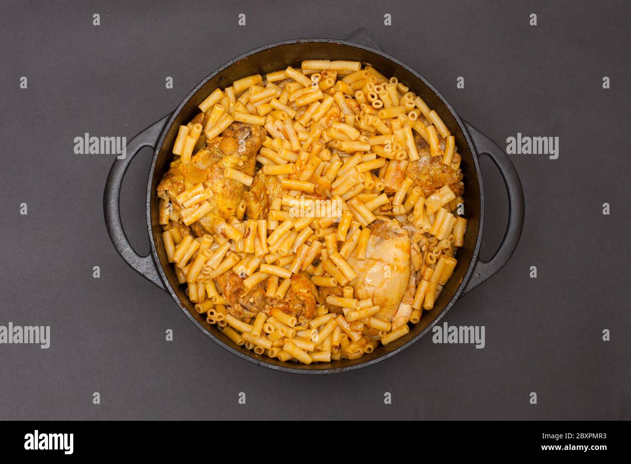 Libyan chicken pasta known as imbakbaka a spicy Middle Eastern dish ...