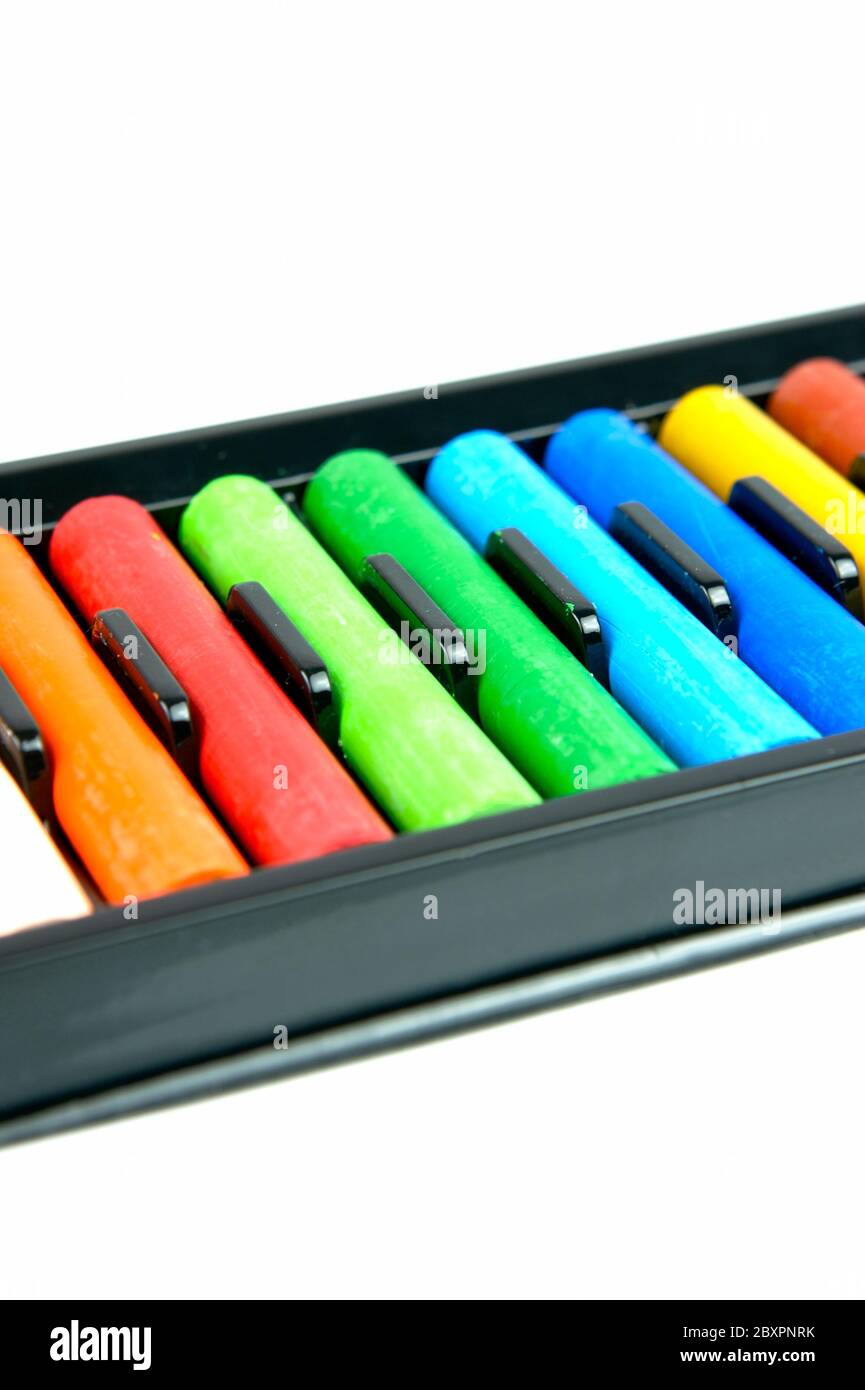 Colored crayons isolated against a white background Stock Photo - Alamy