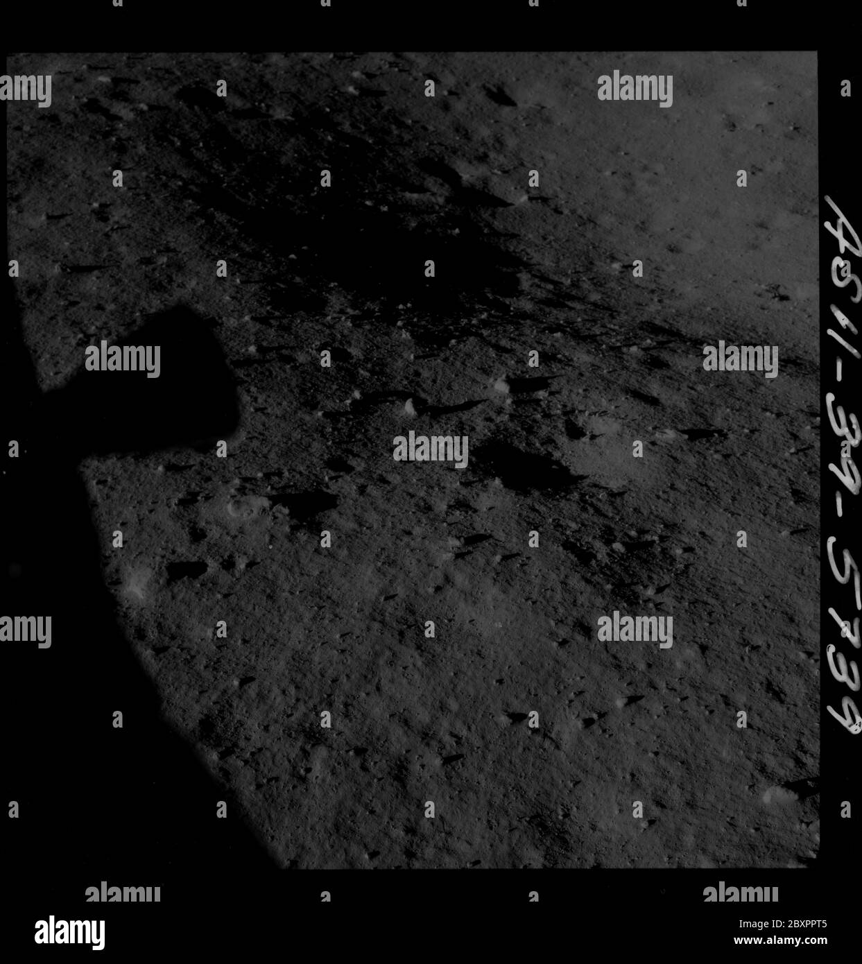 AS11-39-5739 - Apollo 11 - Apollo 11 Mission image - Lunar surface with ...