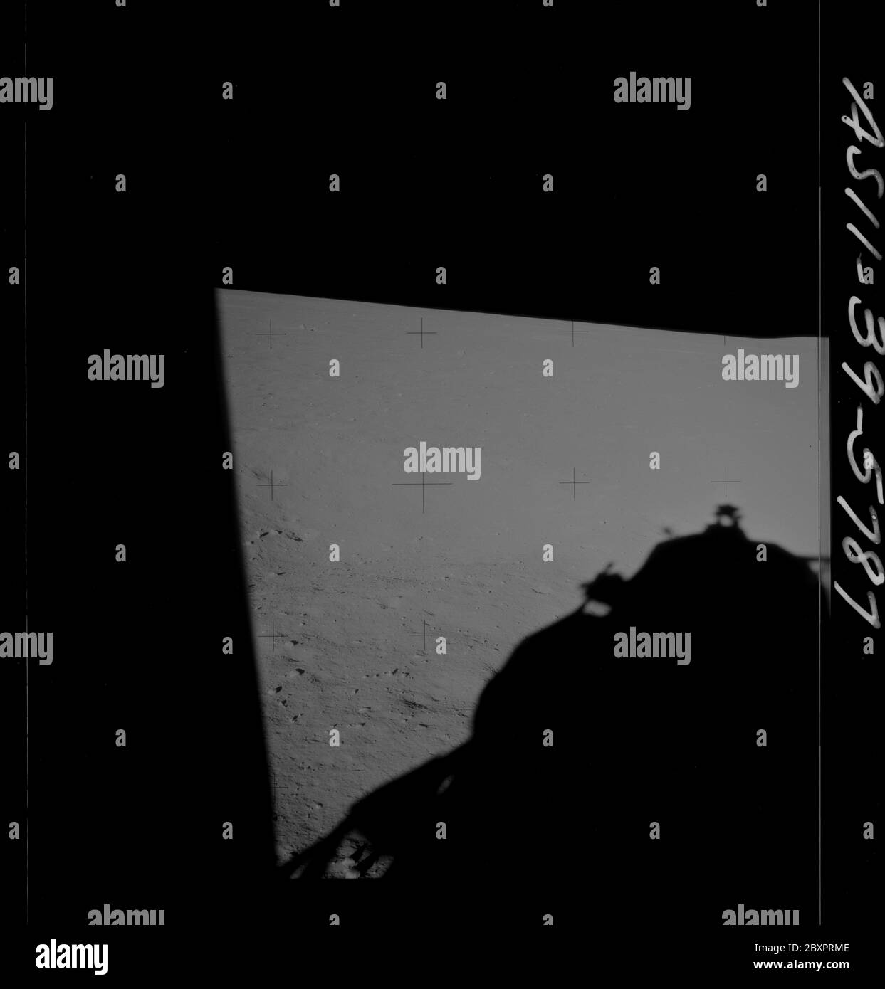 AS11-39-5787 - Apollo 11 - Apollo 11 Mission image - Shadow of Lunar ...