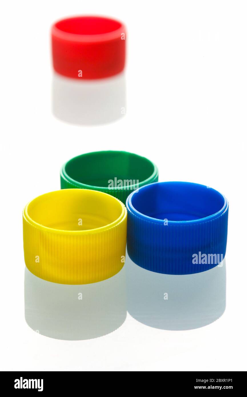 Bottle caps isolated against a white background Stock Photo - Alamy