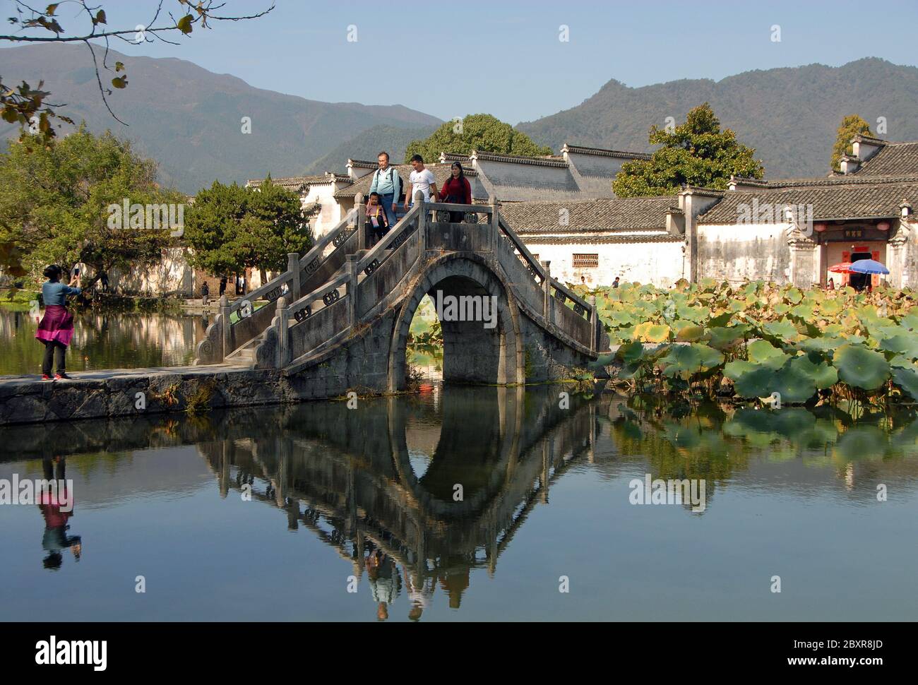 Hongcun Ancient Town in Anhui Province, China. View of the stone bridge ...