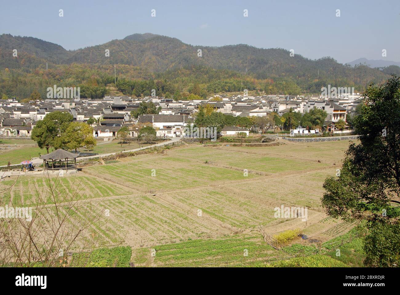 Xidi Ancient Town in Anhui Province, China. Looking over fields on the ...