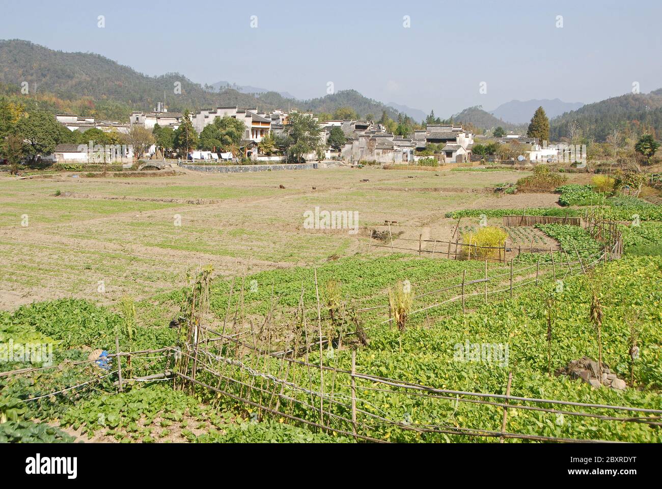 Xidi Ancient Town in Anhui Province, China. Looking over fields on the ...