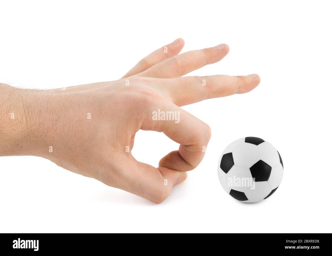 Hand and soccer ball isolated on white background Stock Photo - Alamy