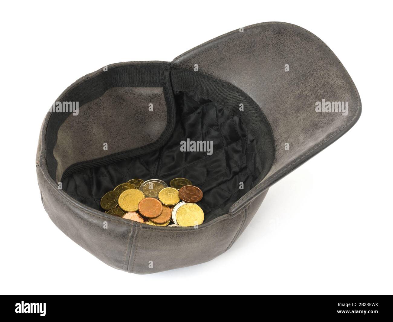 Cap with money Stock Photo - Alamy
