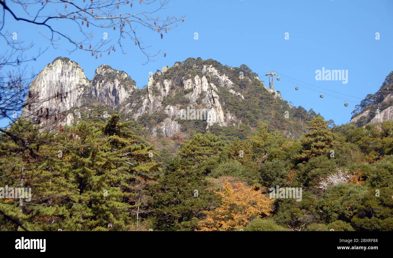 Huangshan Mountain in Anhui Province, China. View of peaks and trees as ...