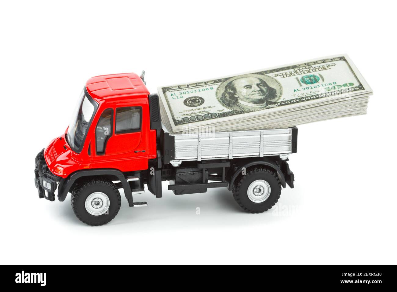 Toy truck with money Stock Photo - Alamy