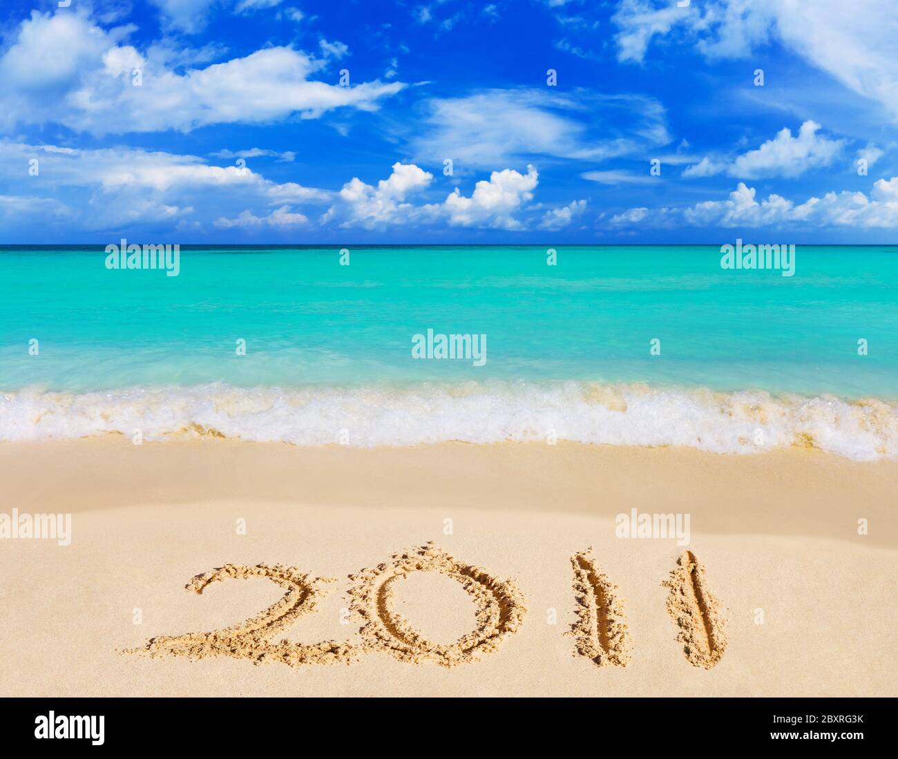 Numbers 2011 on beach Stock Photo - Alamy