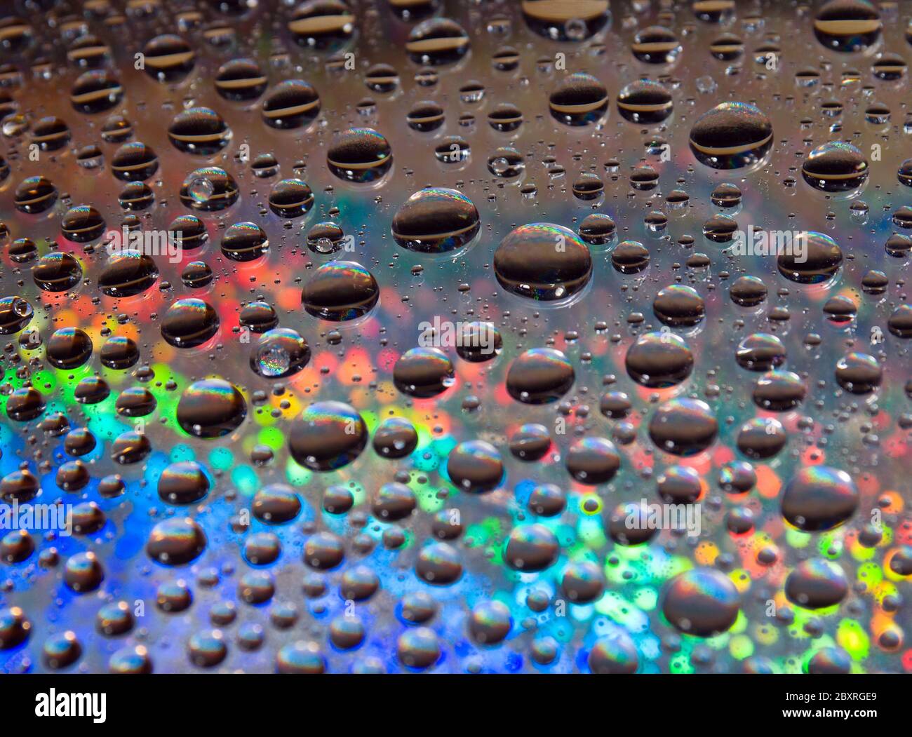 colorful waterdrops on steamy window Stock Photo - Alamy