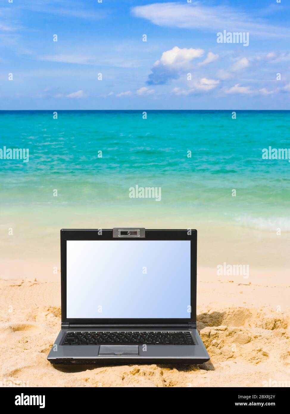 Notebook on beach Stock Photo - Alamy