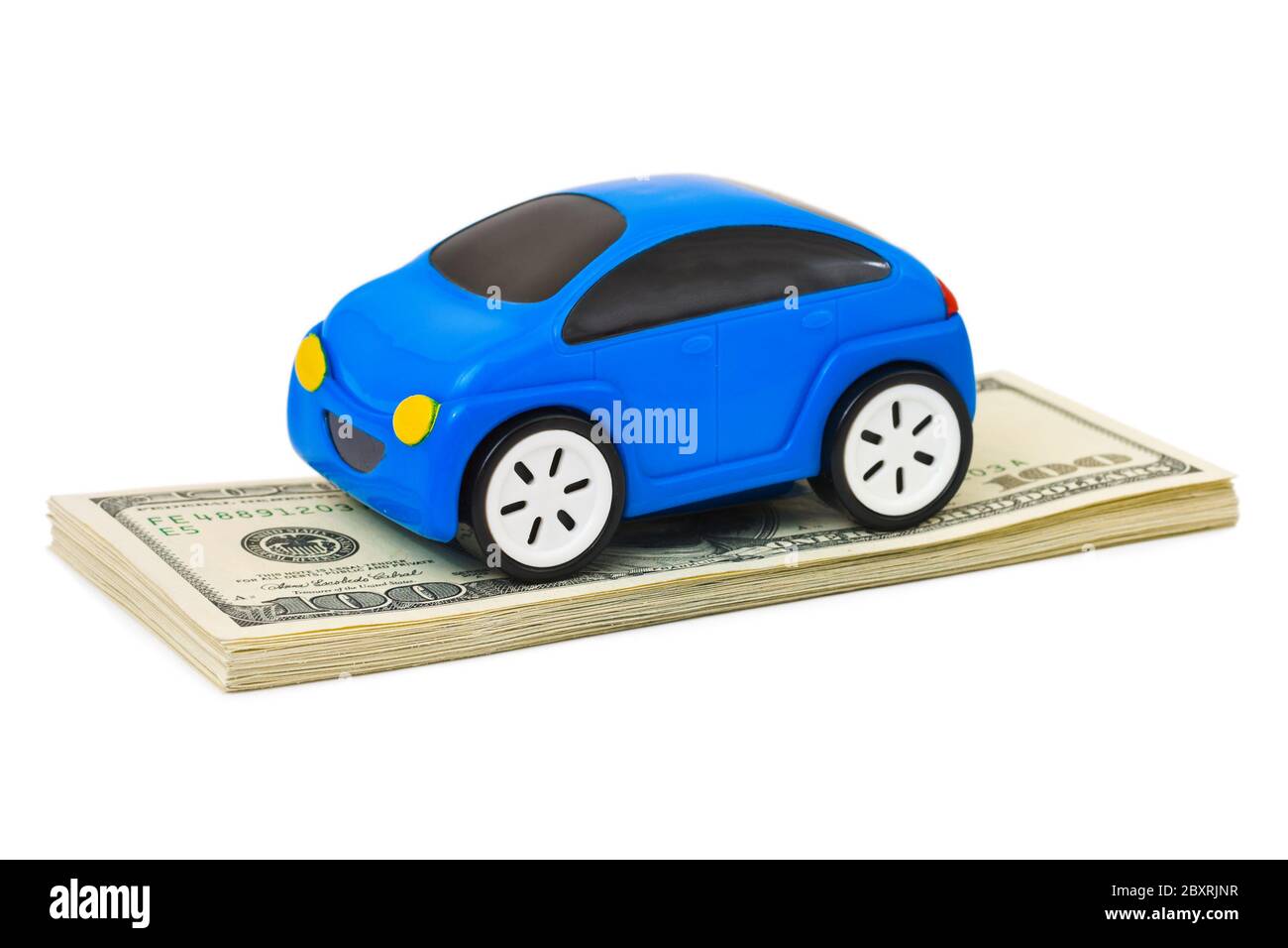 Toy car and money Stock Photo - Alamy