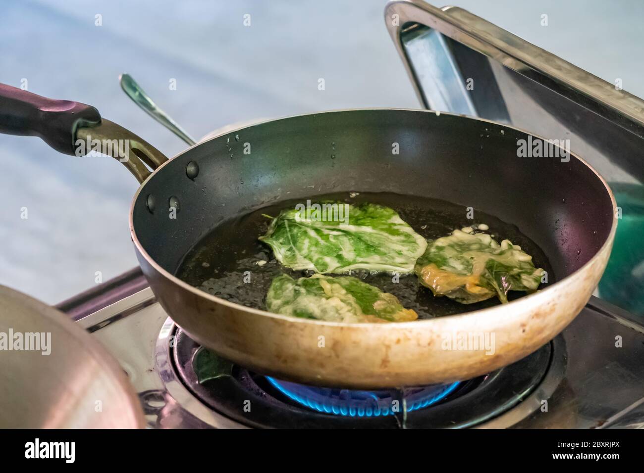 fried ChaPlu leaf (Wild Betel Leafbush) in the pan for eat with ...
