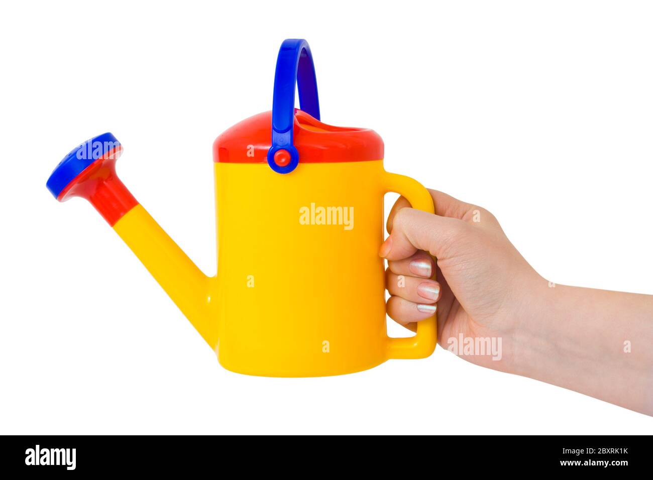Hand with watering can Stock Photo - Alamy