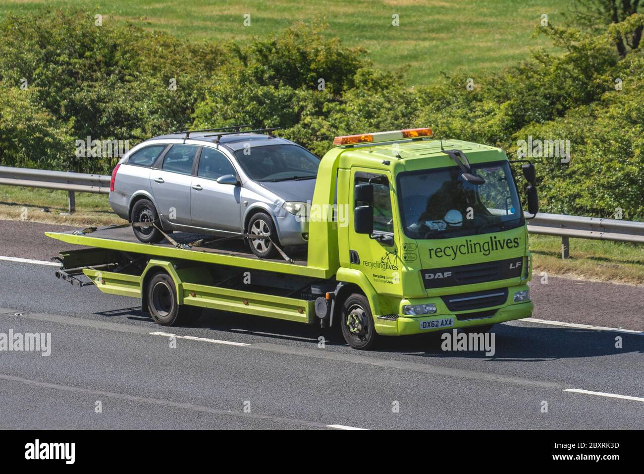 Flat bed vehicle carrying single car hi-res stock photography and ...