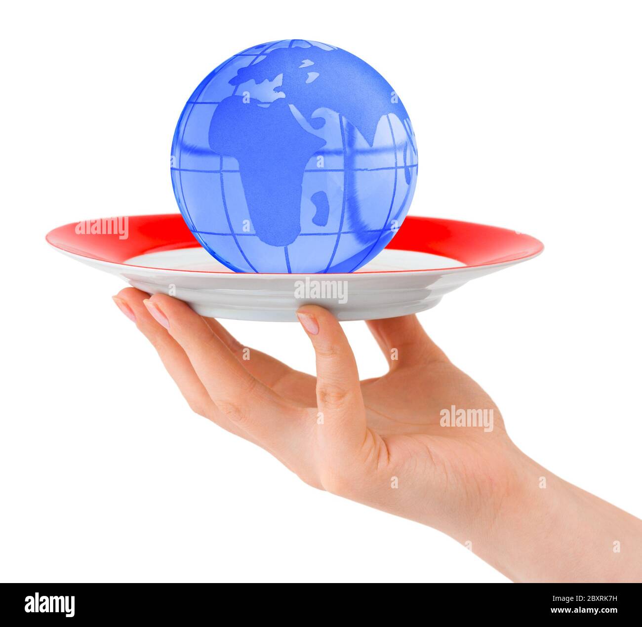 Hand with plate and globe Stock Photo - Alamy