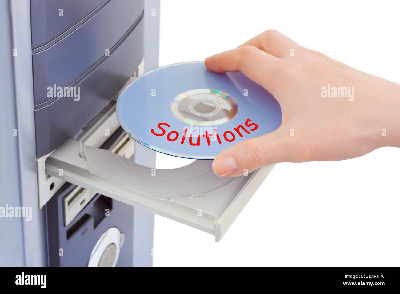 Hand and computer disk solution Stock Photo - Alamy