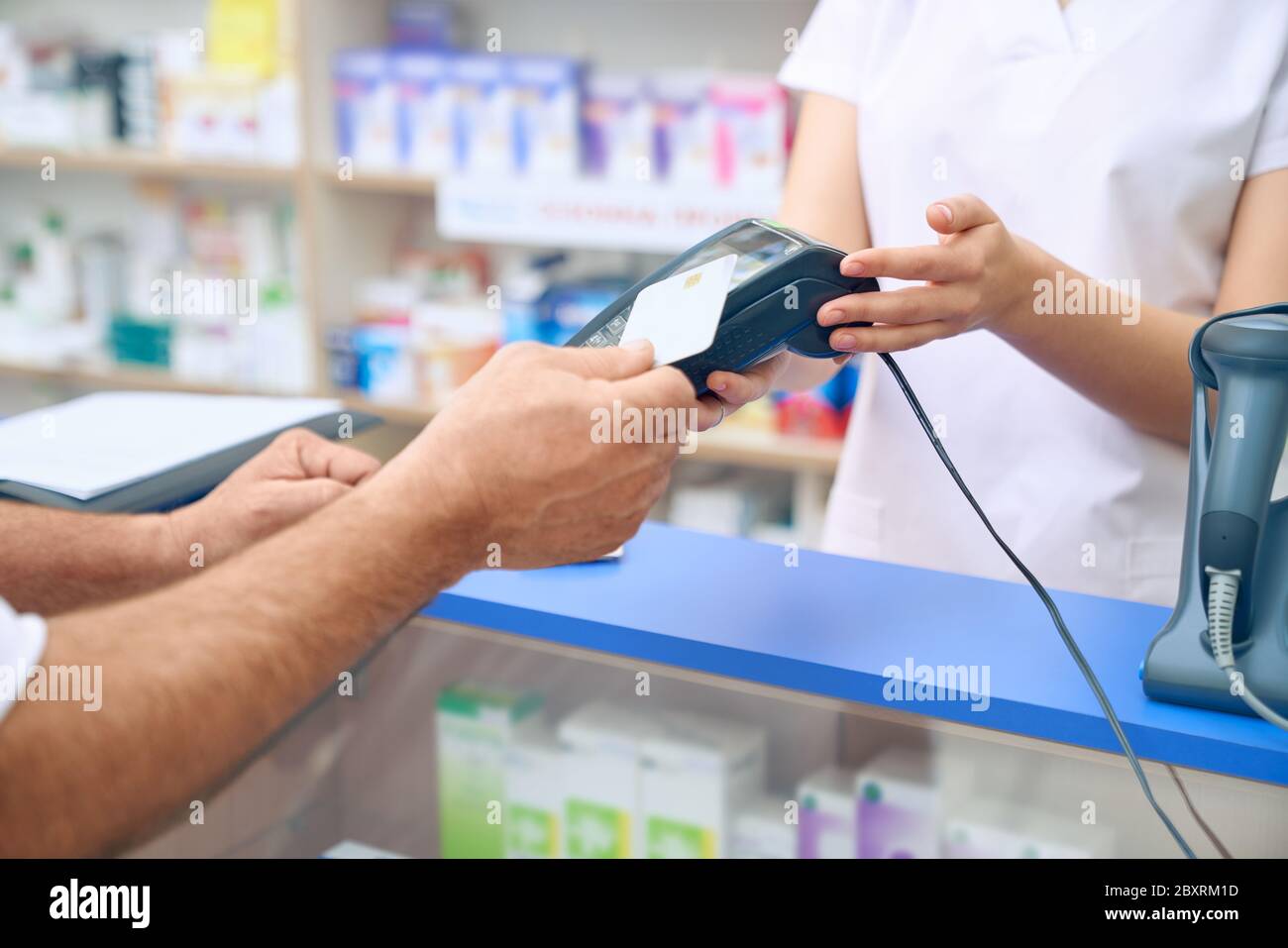 Pay at counter hi-res stock photography and images - Alamy