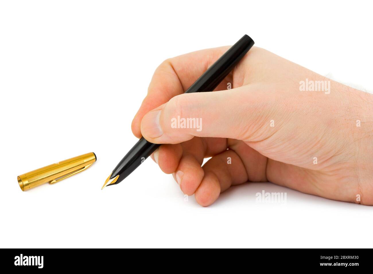 Fountain pen in hand Stock Photo - Alamy