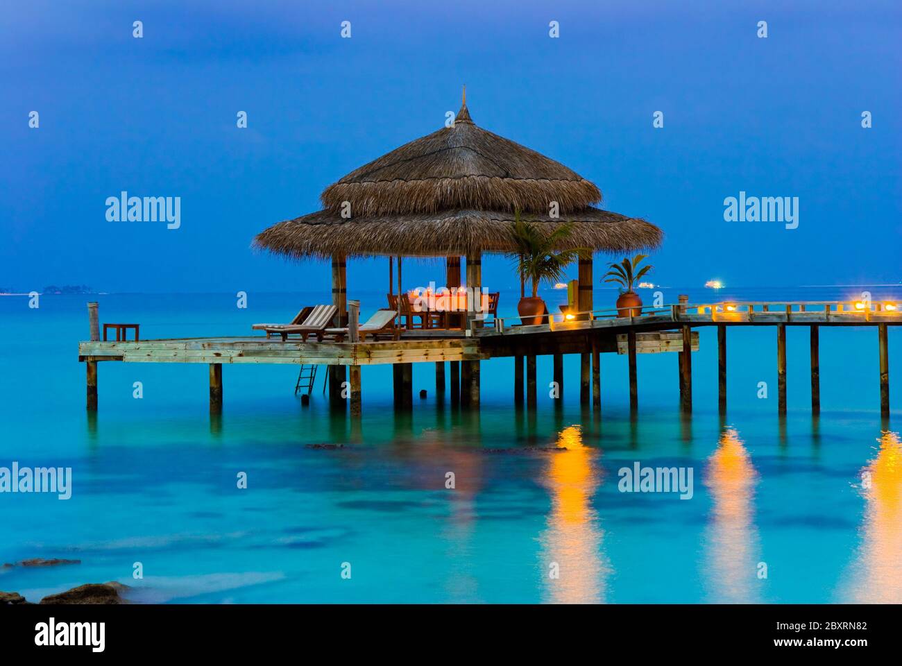 Water cafe at evening Stock Photo - Alamy