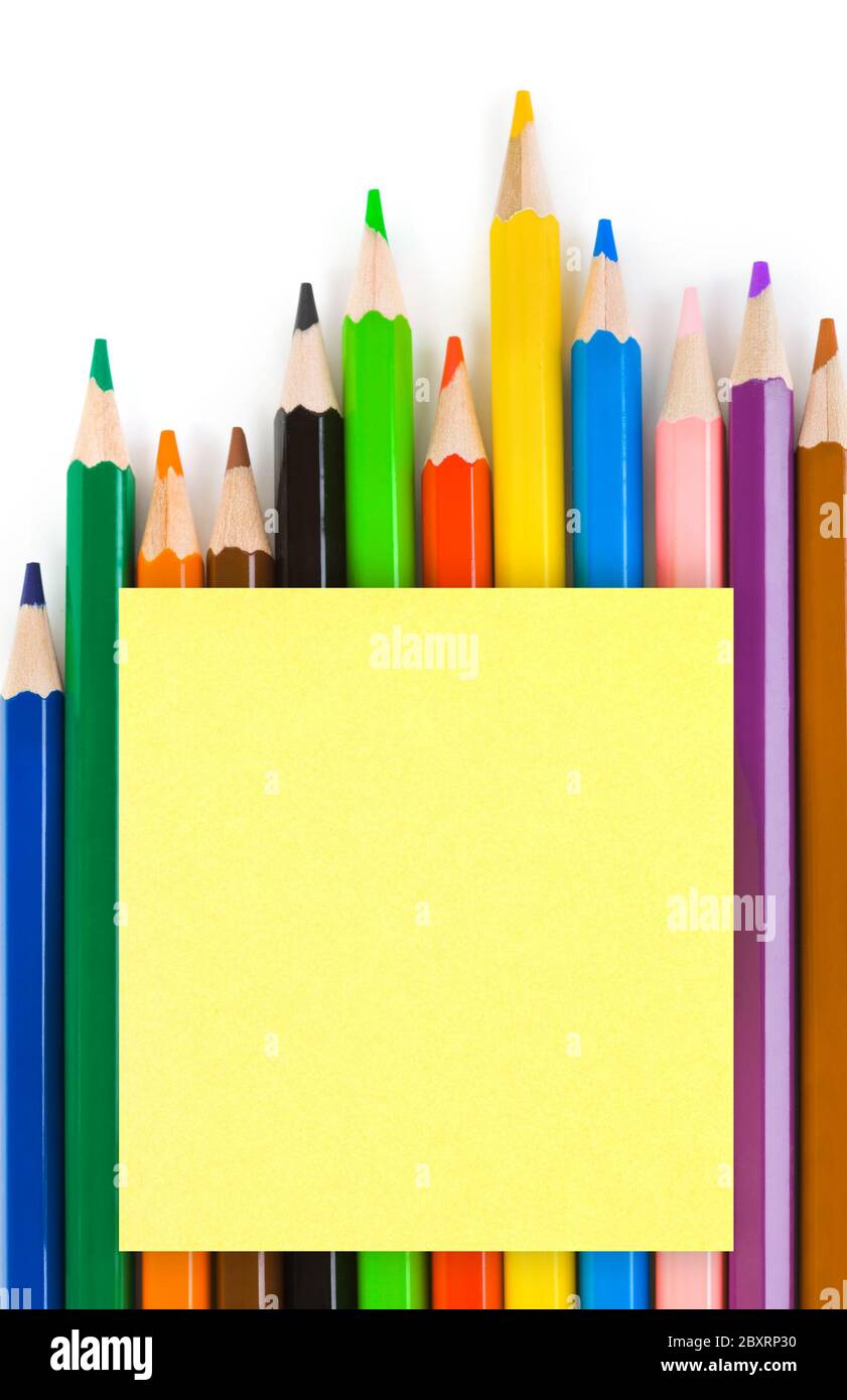 Multicolored pencils and paper Stock Photo - Alamy