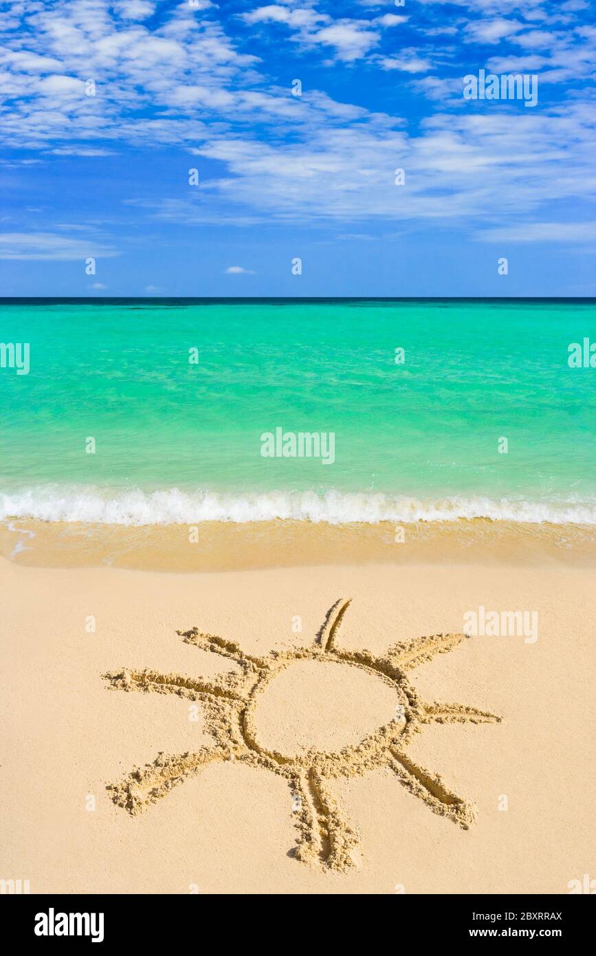 Drawing sun on beach Stock Photo - Alamy