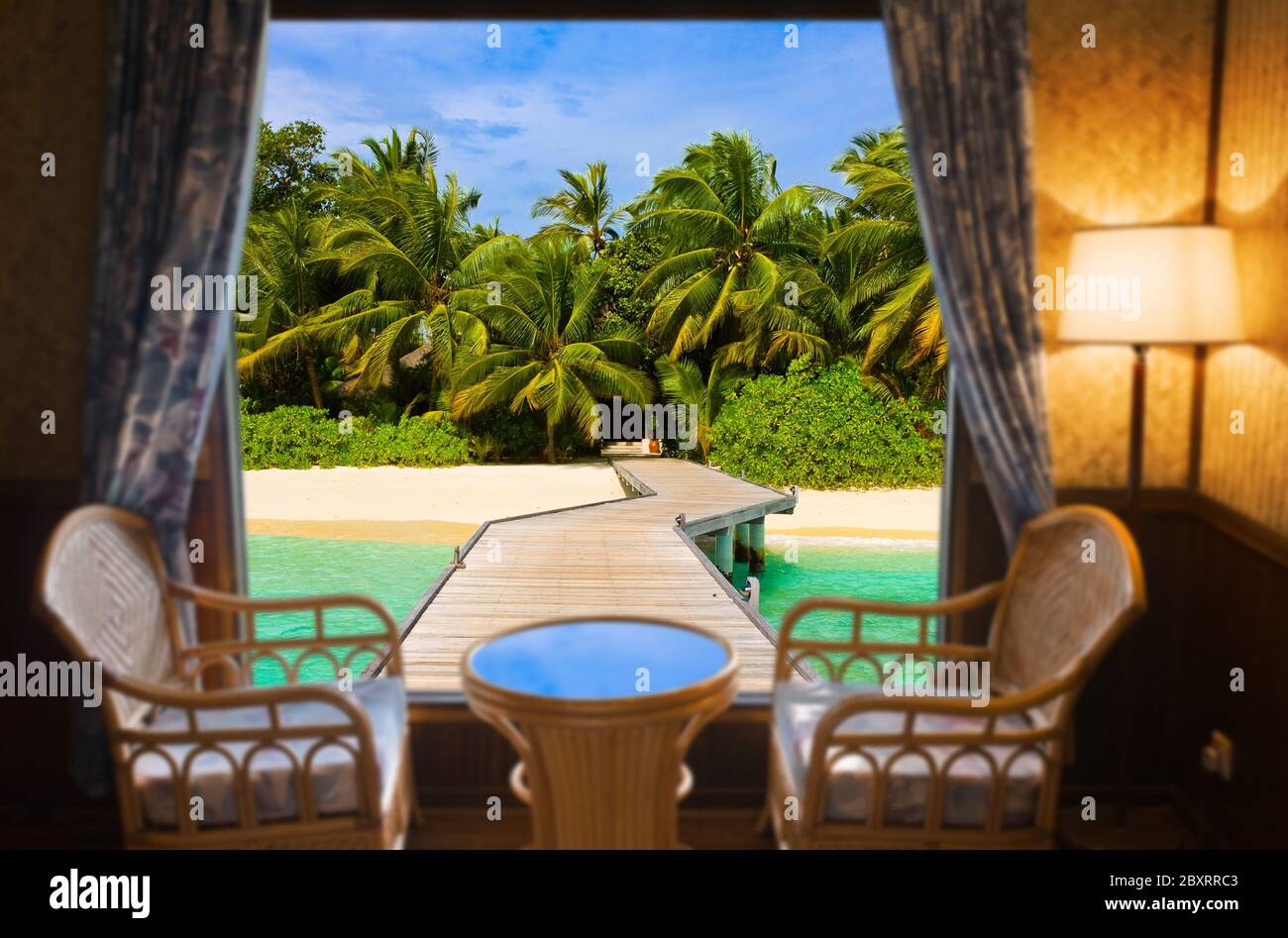 Hotel room and tropical landscape Stock Photo - Alamy