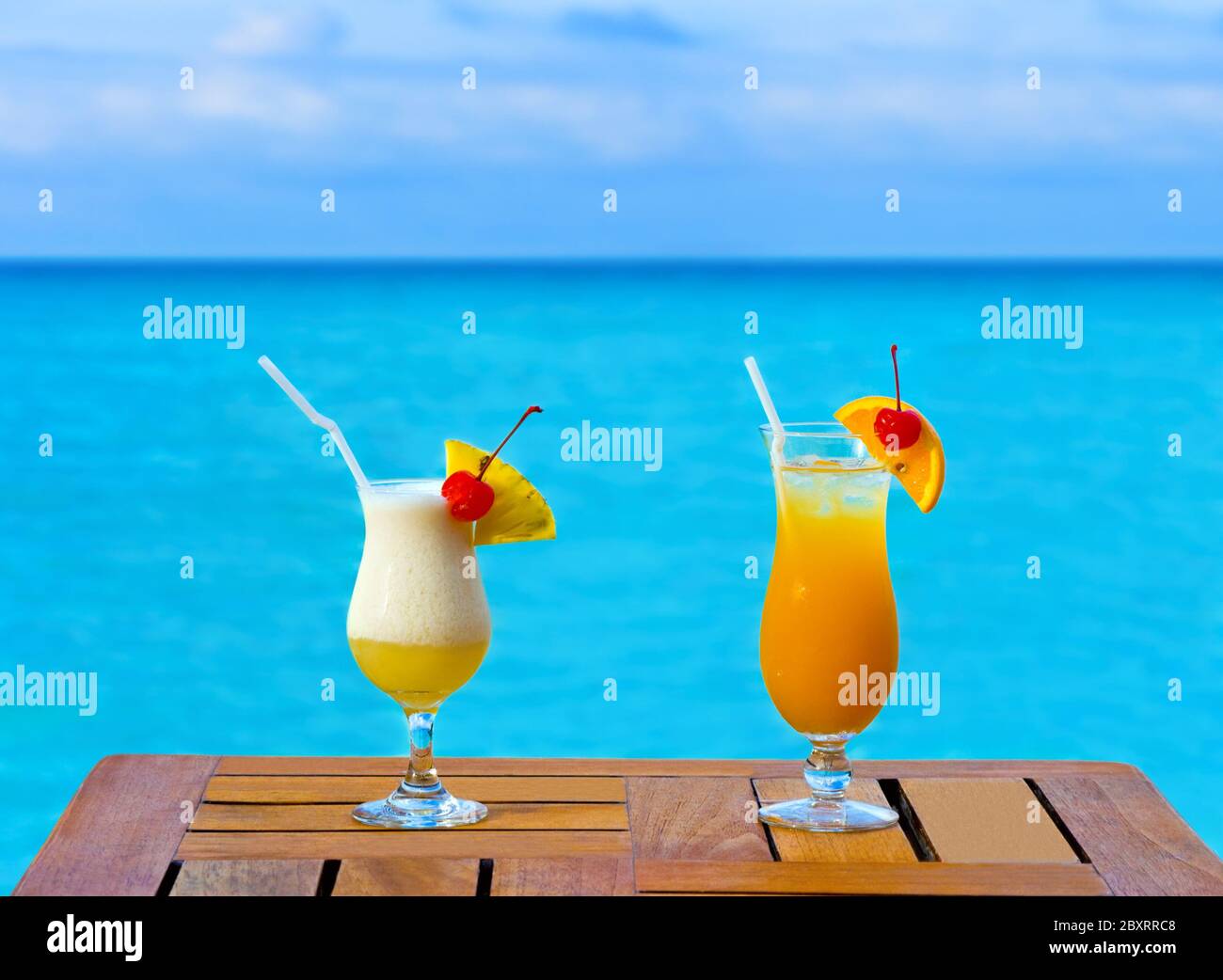 Two cocktails on table Stock Photo - Alamy