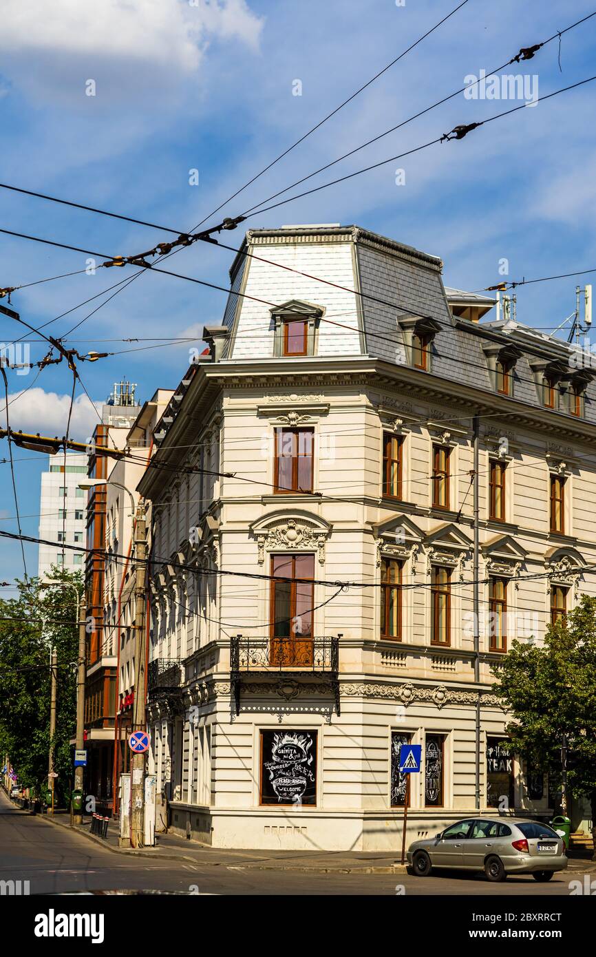 Old building facade in the summer. Downtown of Bucharest, Romania, 2020 ...