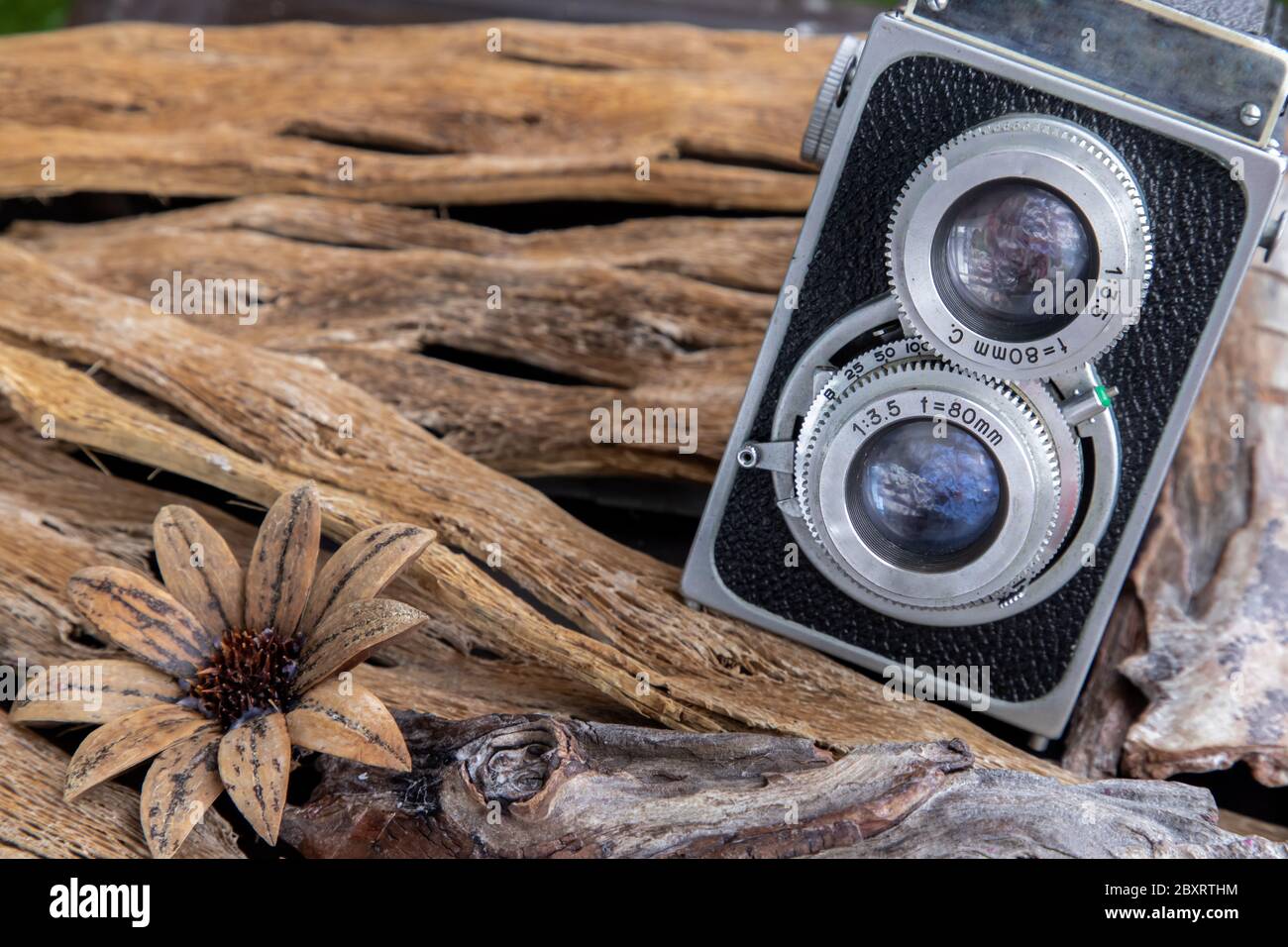 Vintage two lens photo camera on wooden background. An idea of old ...