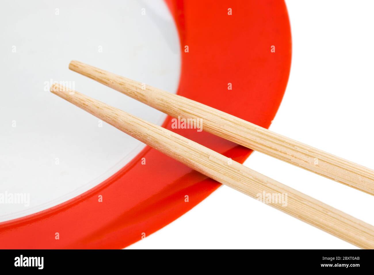 Plate and chopsticks Stock Photo - Alamy