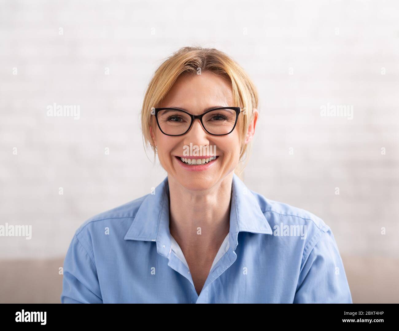 Recording online lessons for students. Teacher looking at camera Stock ... Recording online lessons for students. Teacher looking at camera Stock ...