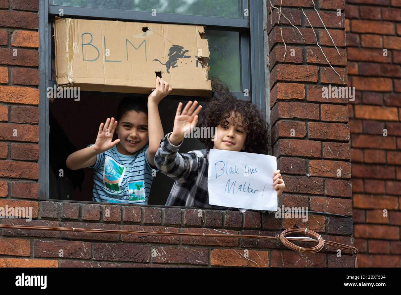 Lean out of window hi-res stock photography and images - Alamy