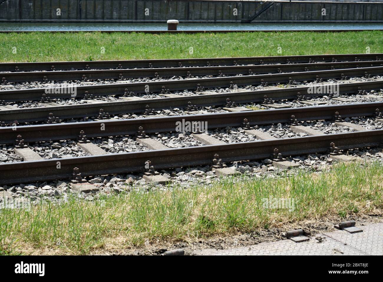 Hardened steel railroad tracks photographed on a sunny spring day Stock ...