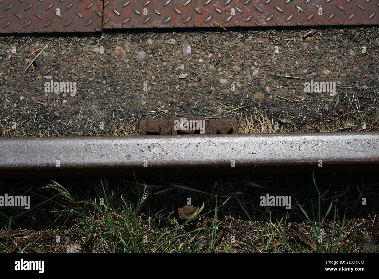 Hardened steel railroad tracks photographed on a sunny spring day Stock ...