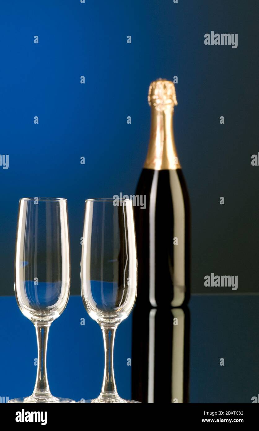 Champagne against color gradient background Stock Photo - Alamy