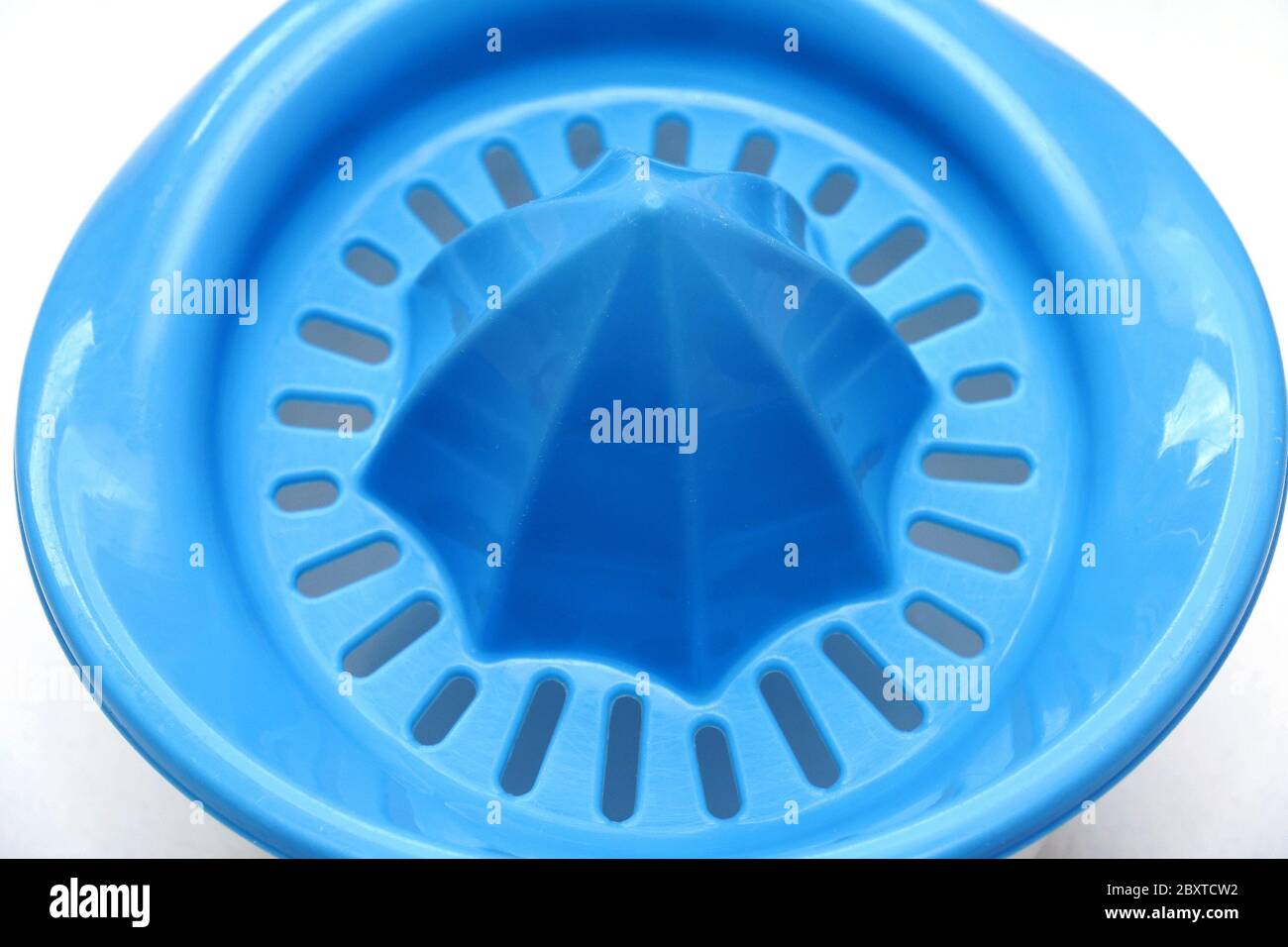 Detail of plastic juice squeezer ready for use Stock Photo - Alamy