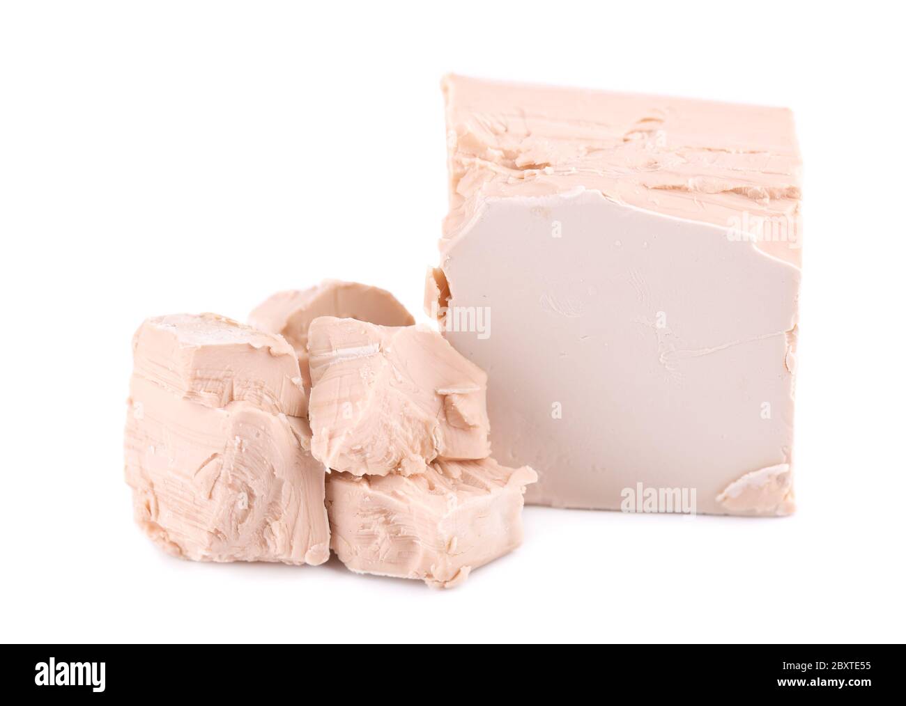 Fresh pressed yeast, isolated on white background. Compressed fresh ...