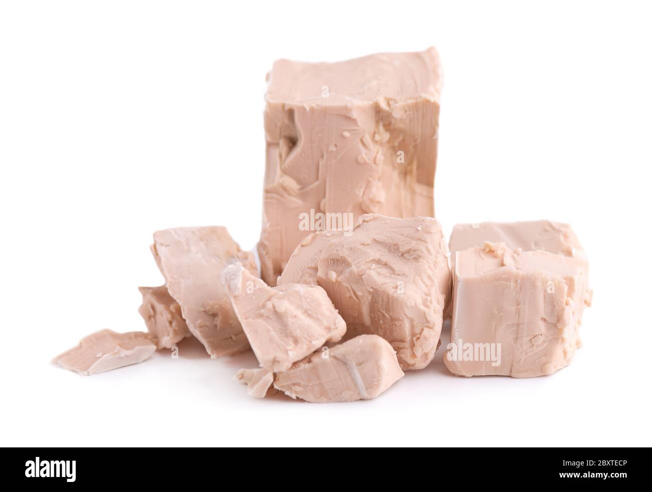 Fresh pressed yeast, isolated on white background. Compressed fresh ...