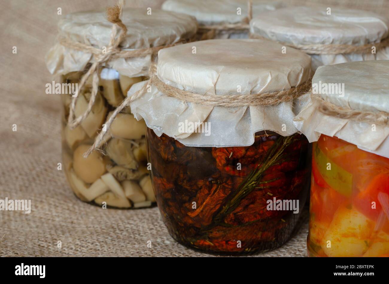 Canned mushrooms, lecho and other home-made canned food. Canned food in ...