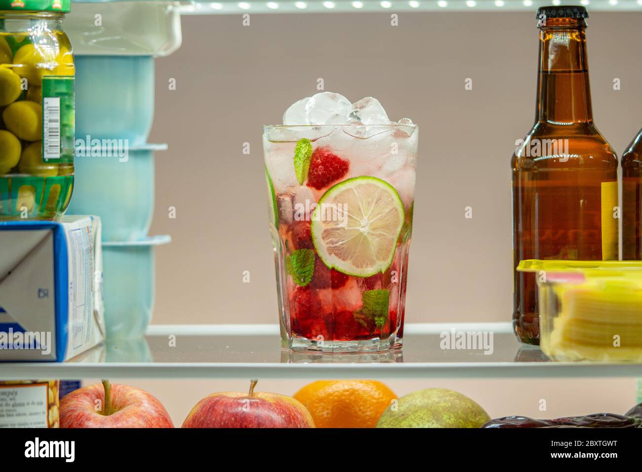 Raspberry mojito cocktail in a fridge. Close up. Cold, fresh and vegan ...