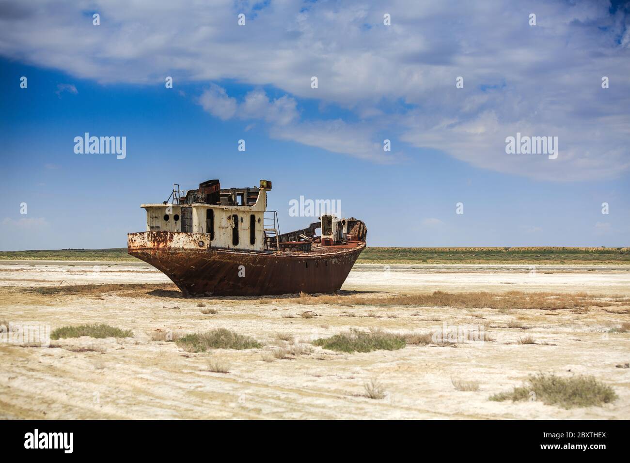 Old fishing schooner at the bottom of the dried Aral Sea Stock Photo ...