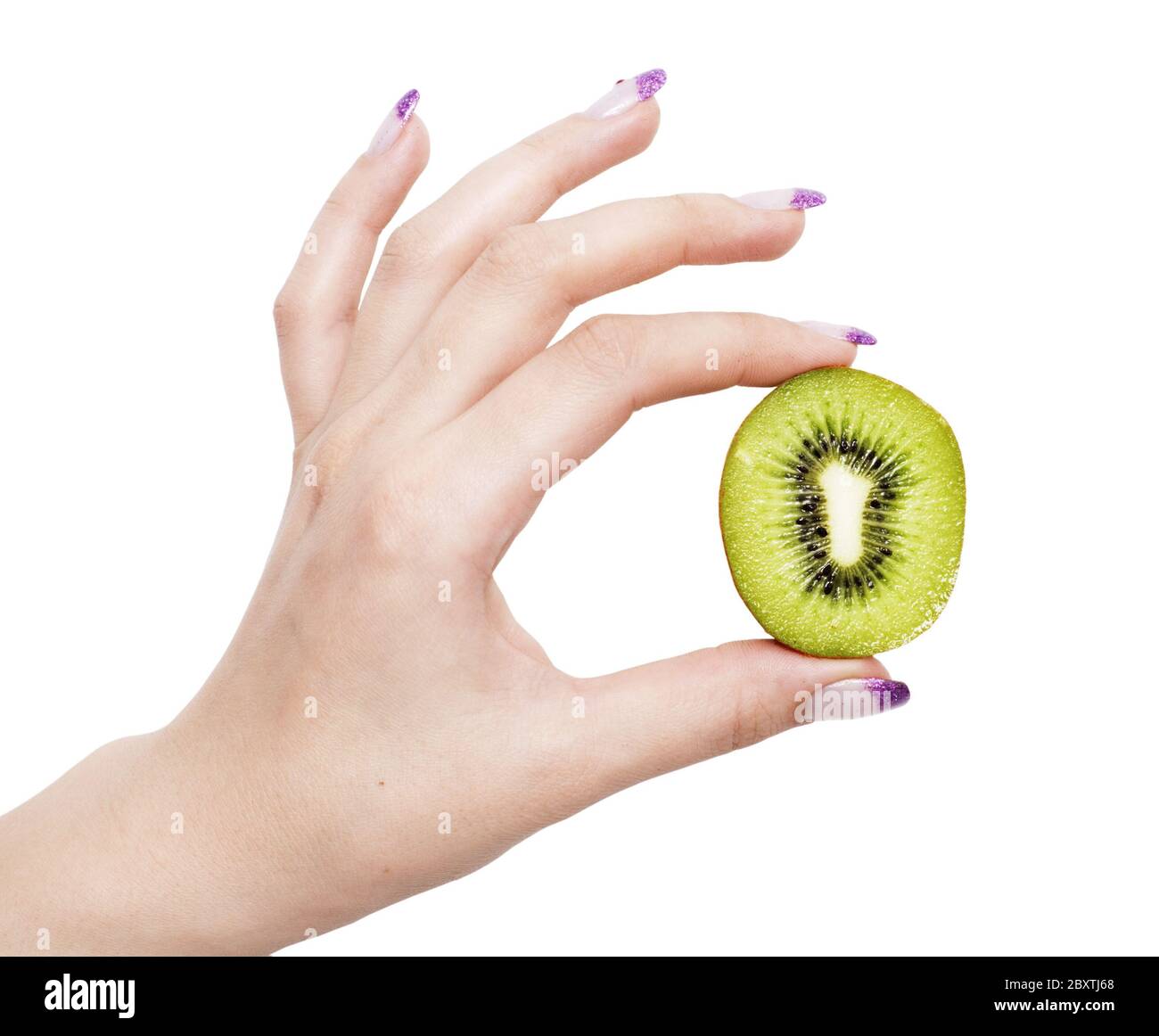 kiwi in hand Stock Photo - Alamy