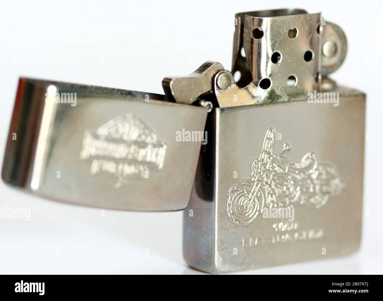 Petrol lighter with engraving harley Stock Photo - Alamy