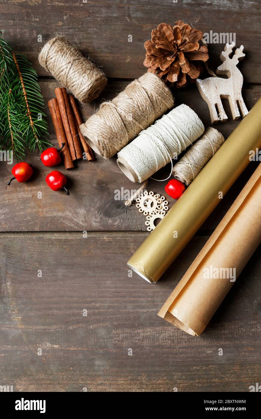 Woman shows how to beautifully pack Christmas presents. Step by step ...