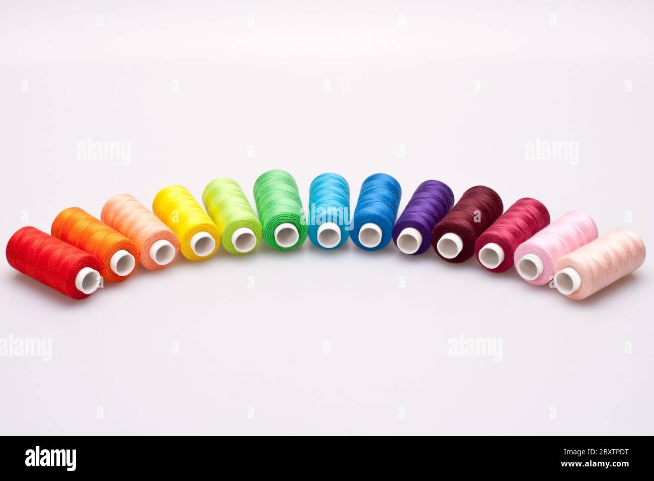 Violet sewing thread spool hi-res stock photography and images - Alamy